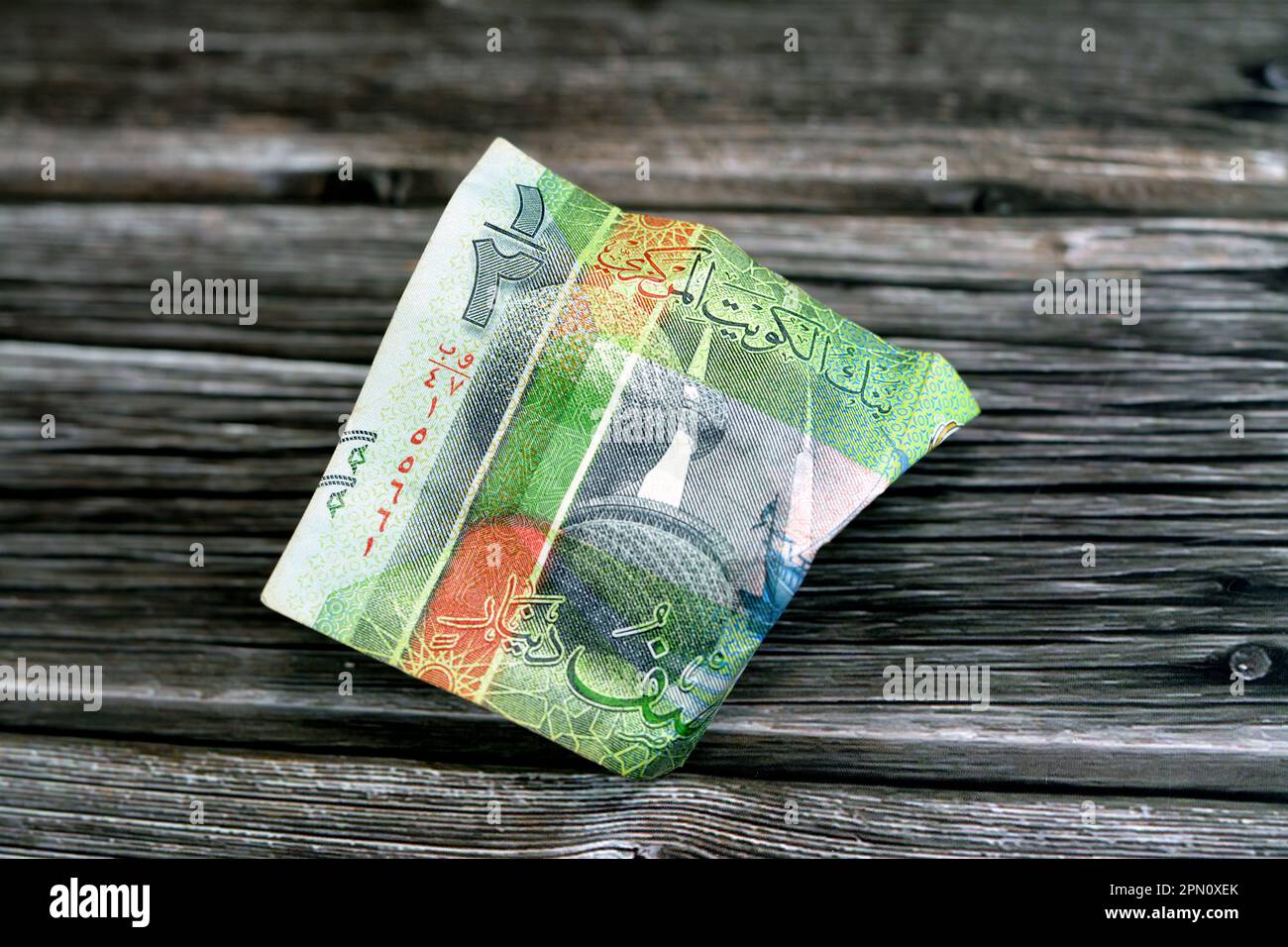 Selective focus of crumpled Kuwaiti money of Half KWD Kuwait dinar bill ...