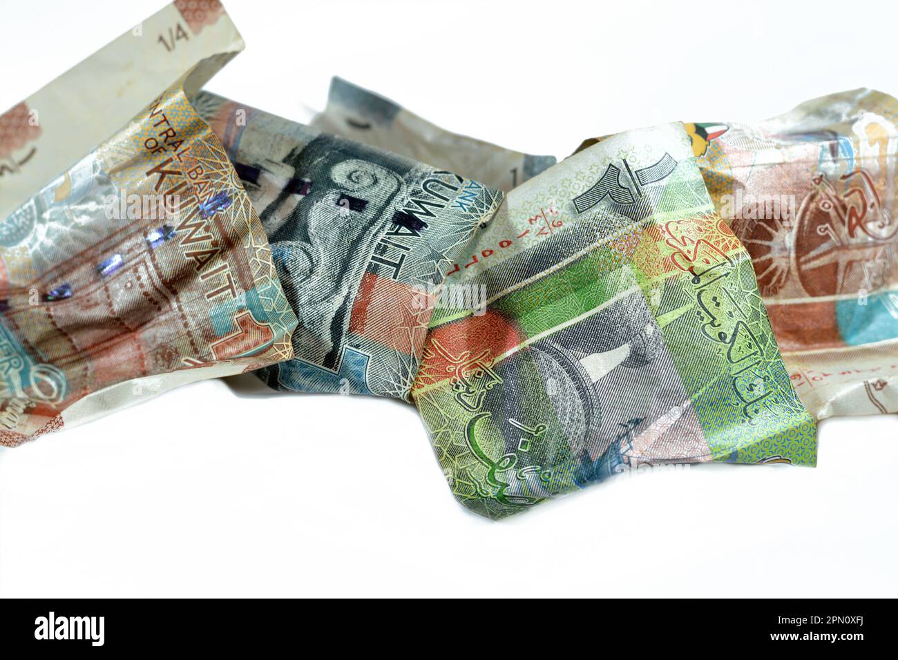 crumpled Kuwaiti money of quarter, half and one KWD Kuwait dinar bills ...