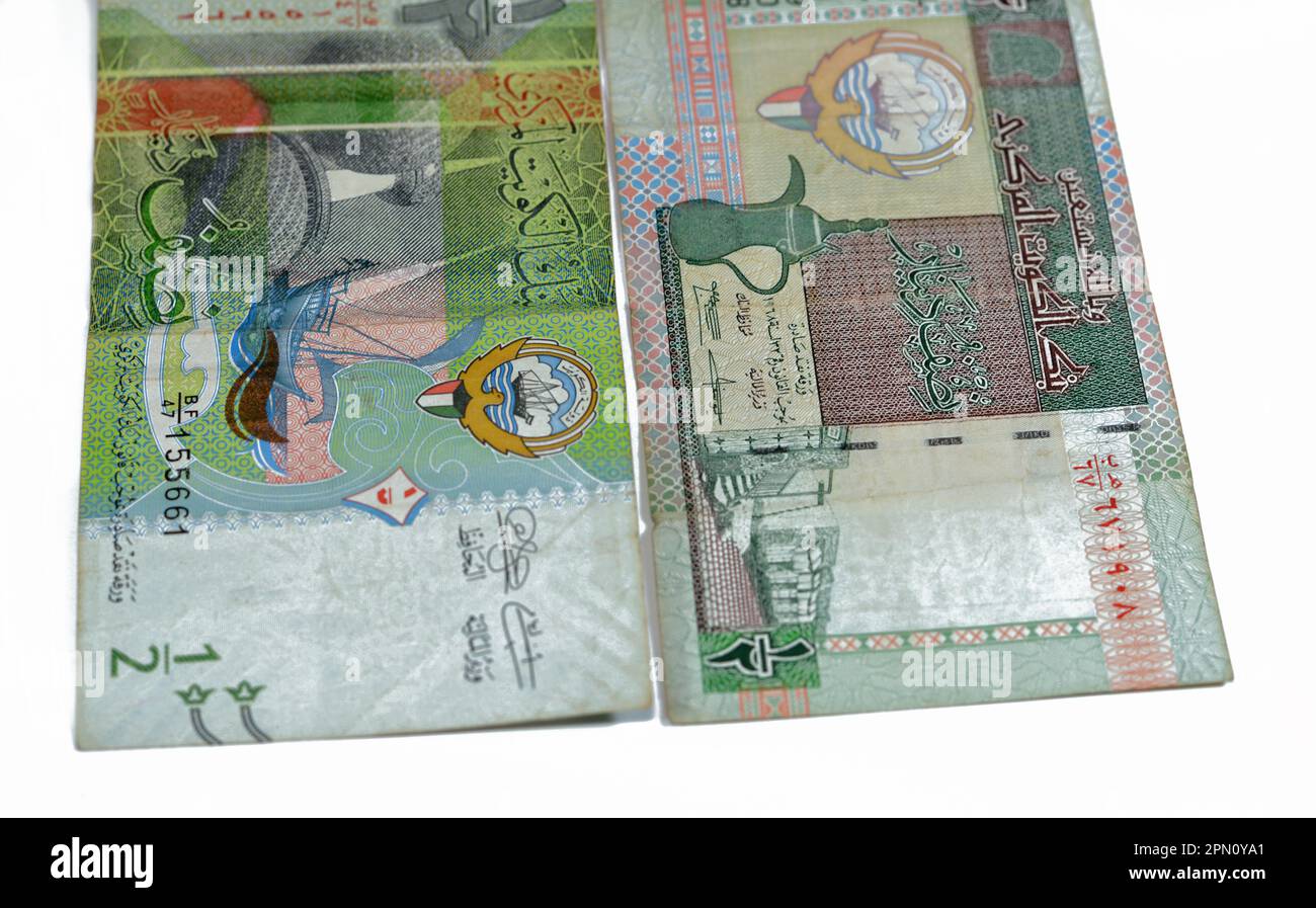 Old and new Kuwaiti half dinar bill banknotes money coat of arms of ...