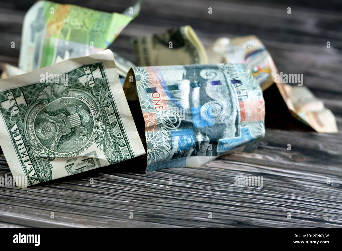 Wrinkled and crumpled Kuwaiti half, quarter and one KWD dinar bills ...