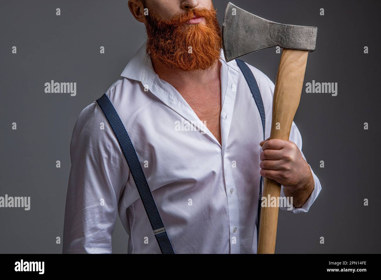 masculinity of man with axe in studio, cropped view. masculinity of man ...
