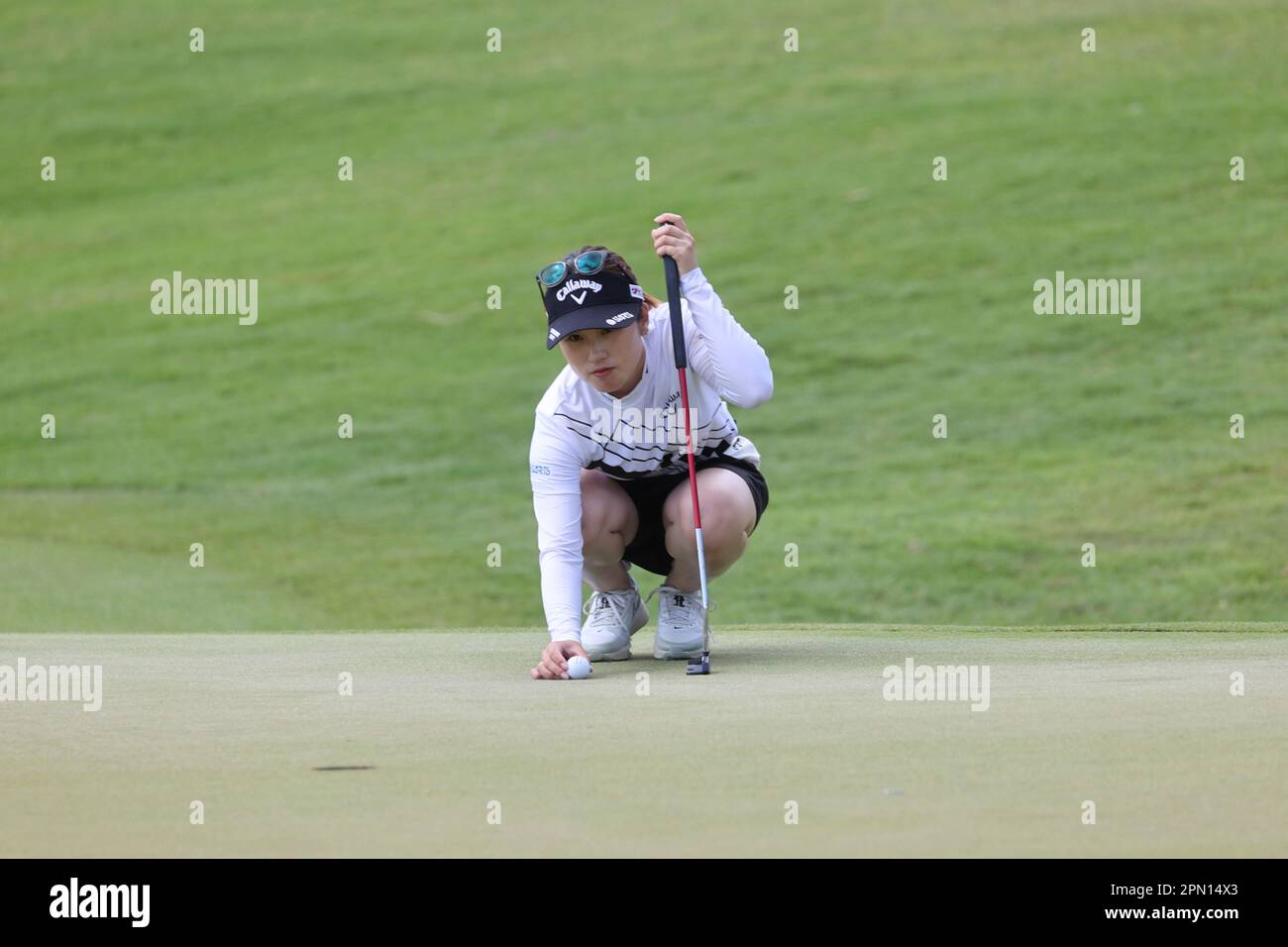 Yuna Nishimura, of Japan, putts on the seventh green during the final round of an LPGA golf ...