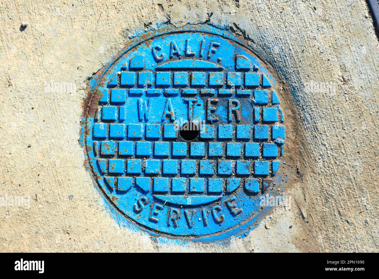 Colorful utility cover is cast with striking patterns and conveys an ...