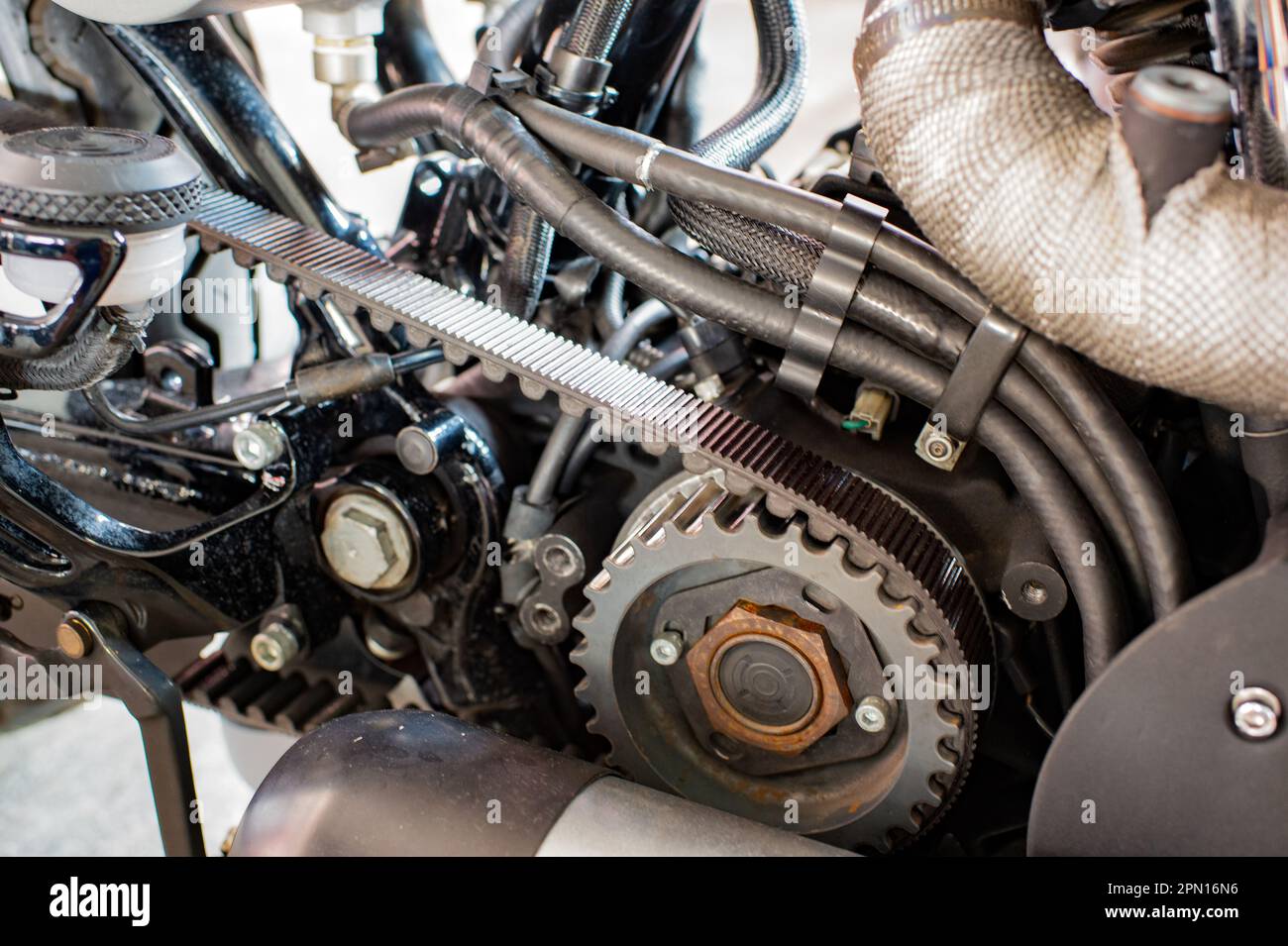 detailed metallic motorcycle engine part of mechanism Stock Photo - Alamy