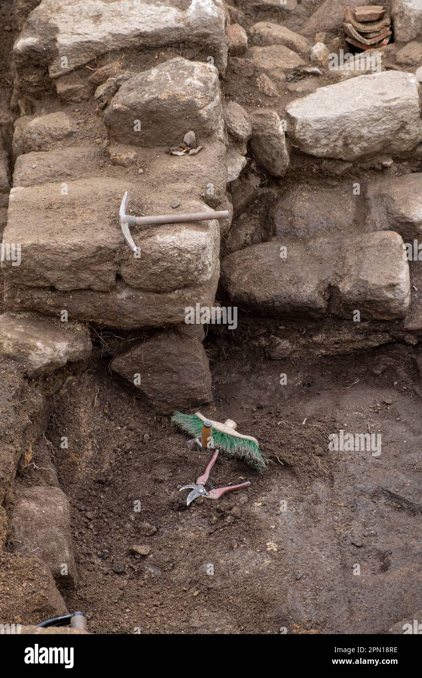 Tools on the ground in an archaeological excavation Stock Photo - Alamy