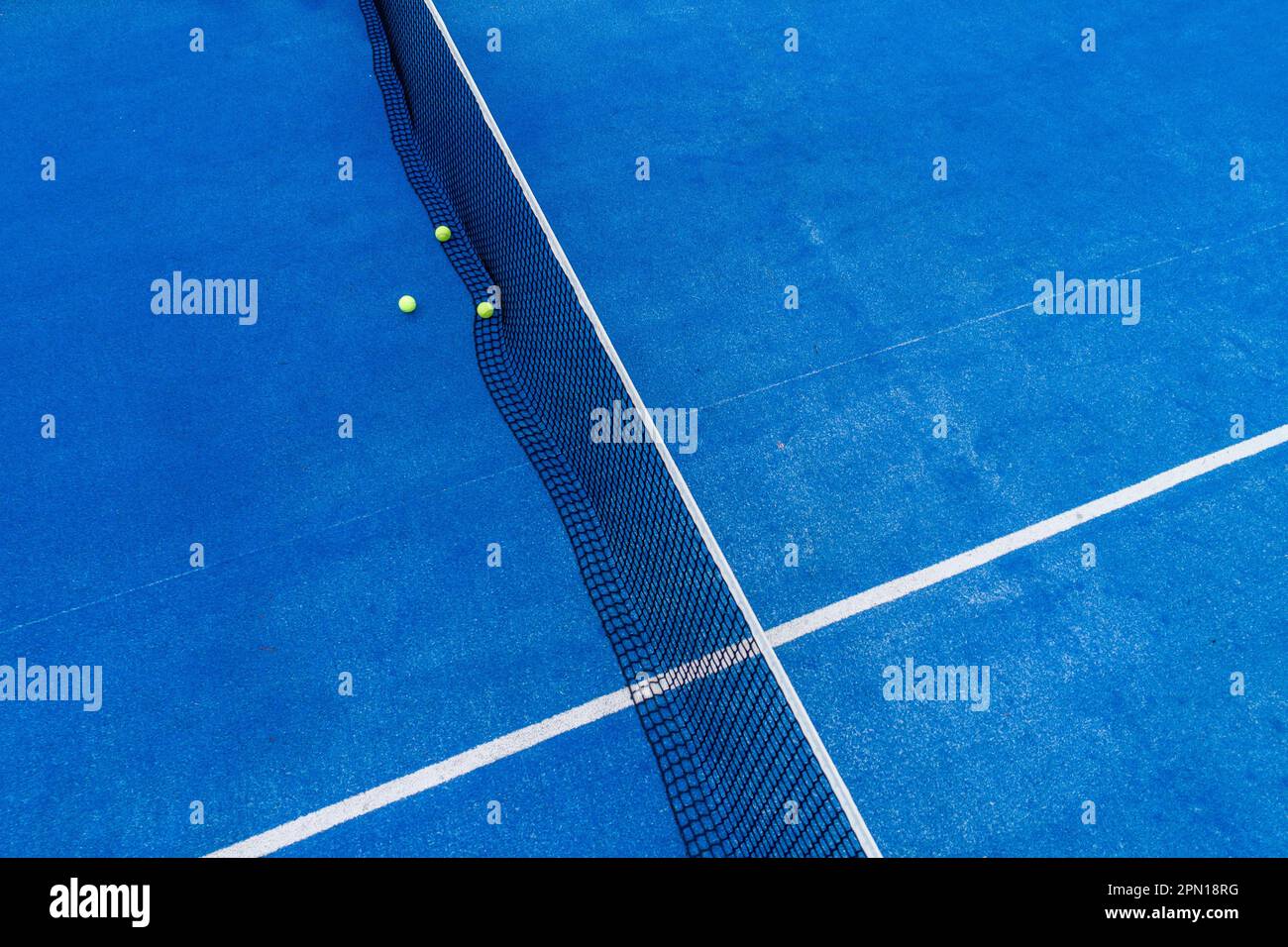 This image is of a tennis court with a net and a tennis ball Stock ...