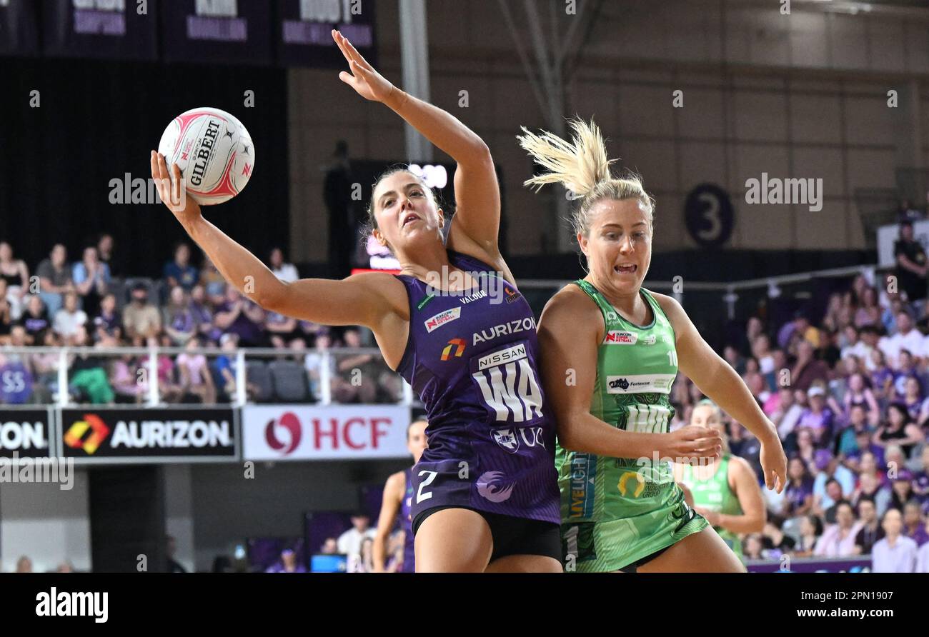 Lara Dunkley (left) of the Firebirds contests for the ball against Jess ...