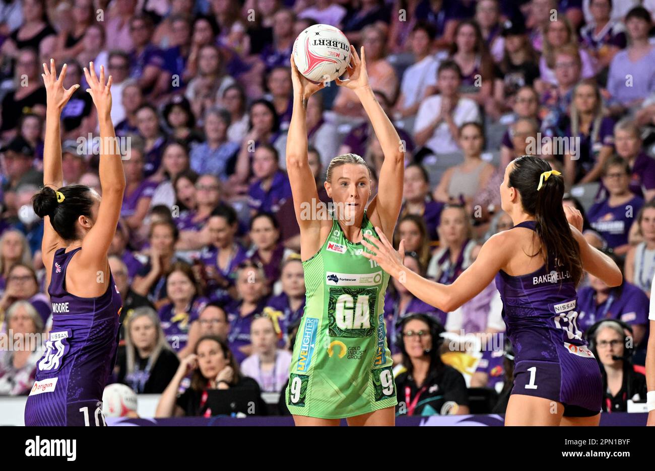 Sasha Glasgow (centre) of the Fever takes on Emily Moore (left) and ...