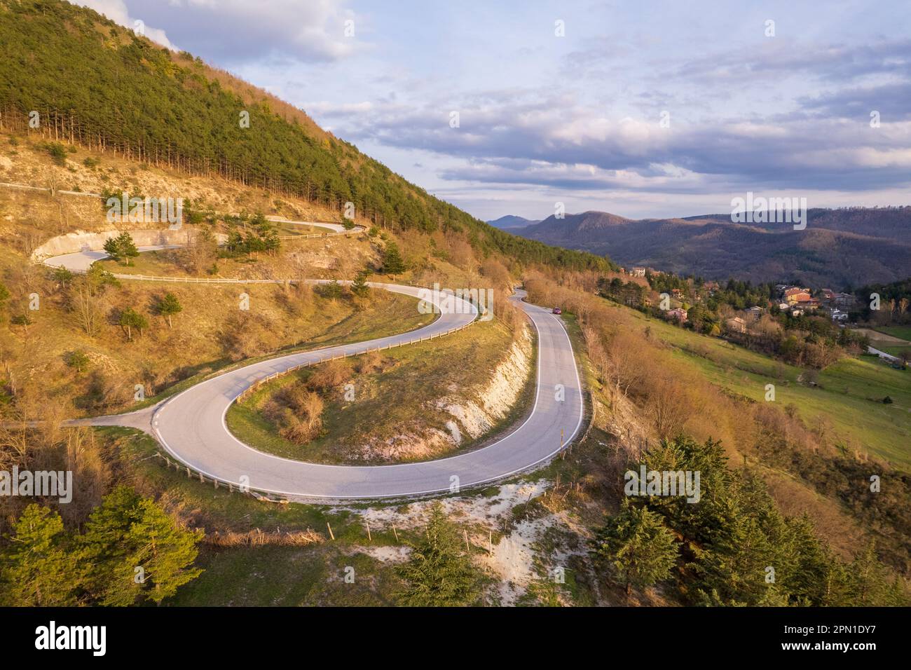 Aerial view of curvy road on monte Nerone slope in Marche region in ...