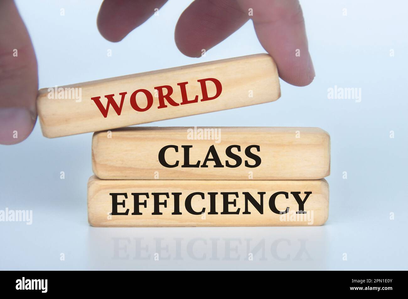 World class efficiency text on wooden blocks. Business culture and ...