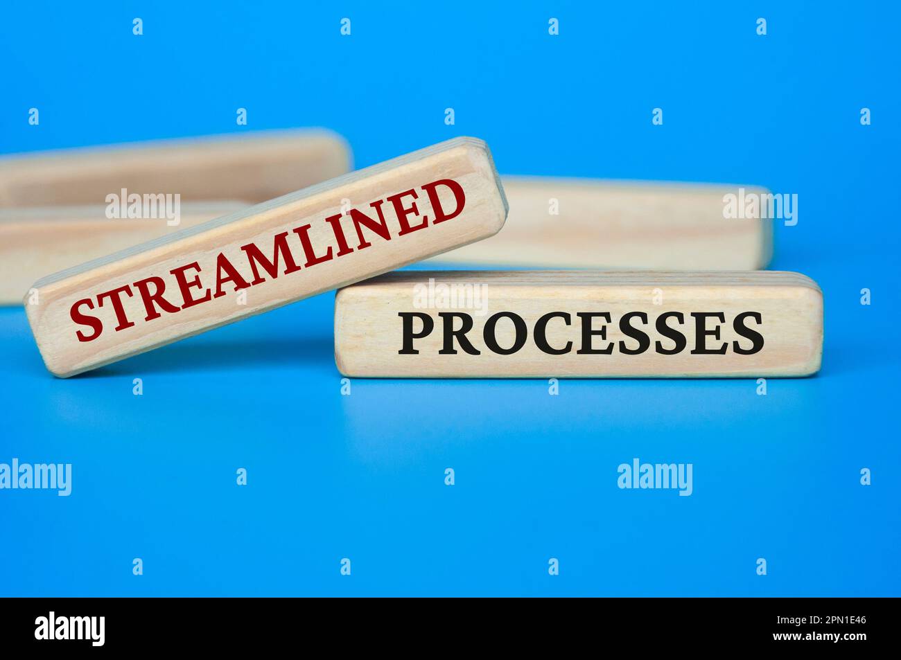 Streamlined process text on wooden blocks. Business culture and ... Streamlined process text on wooden blocks. Business culture and ...