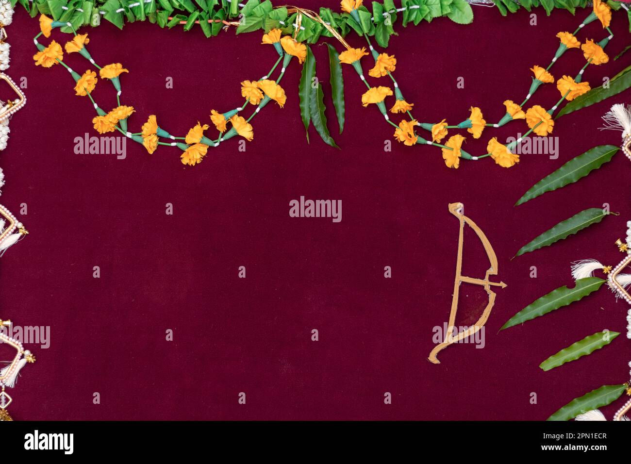 bow with flowers with maroon background from top angle Stock Photo - Alamy