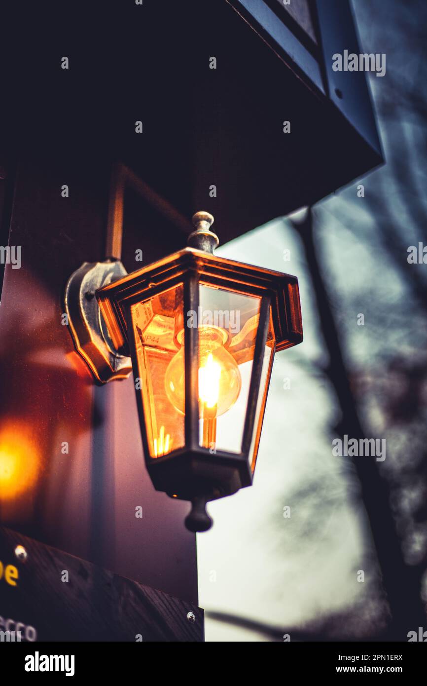 Yellow flashlight in the park night photo Stock Photo - Alamy