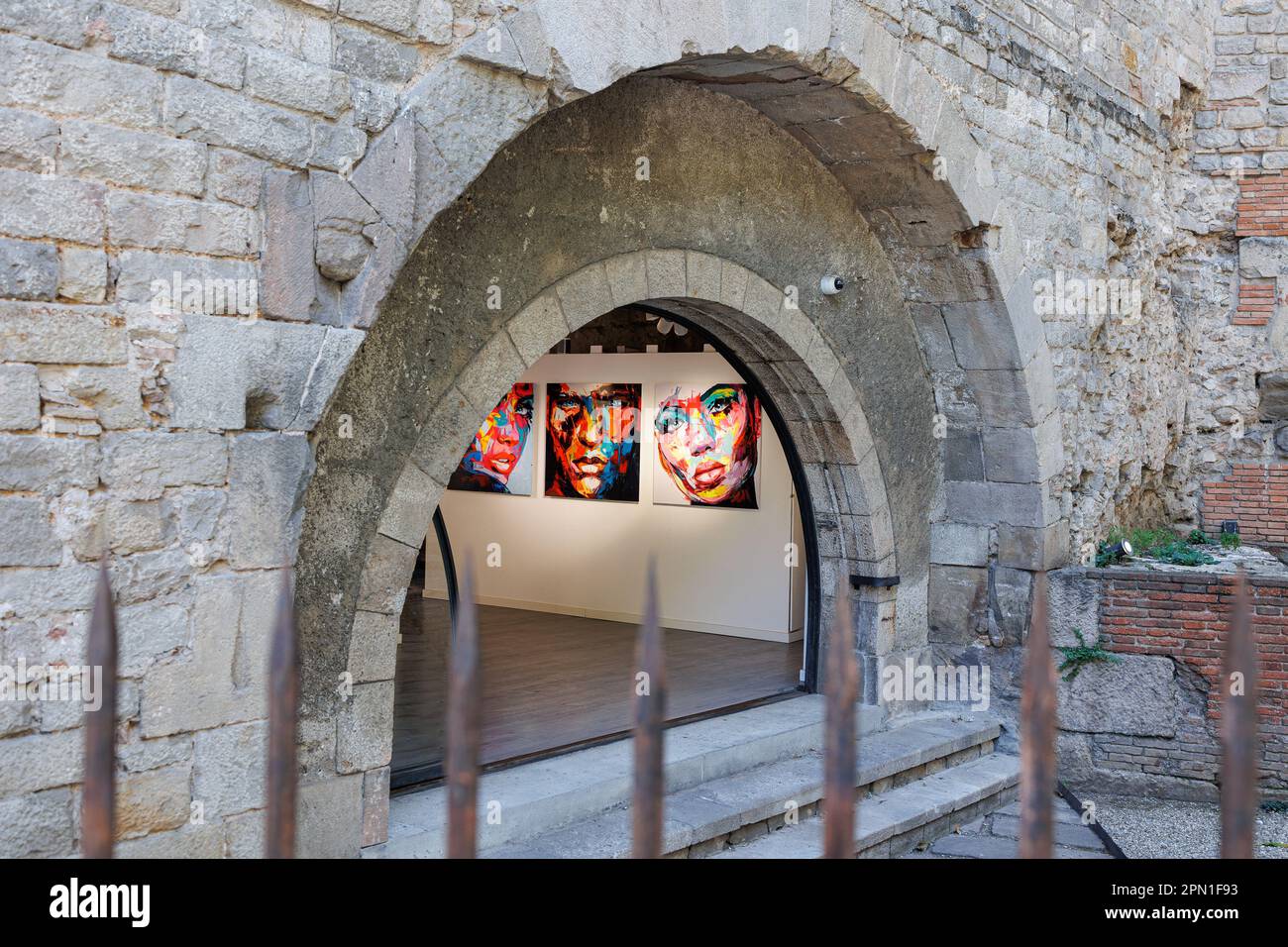 View of an Exhibition of Painting Art from an Archway Opening of a ...