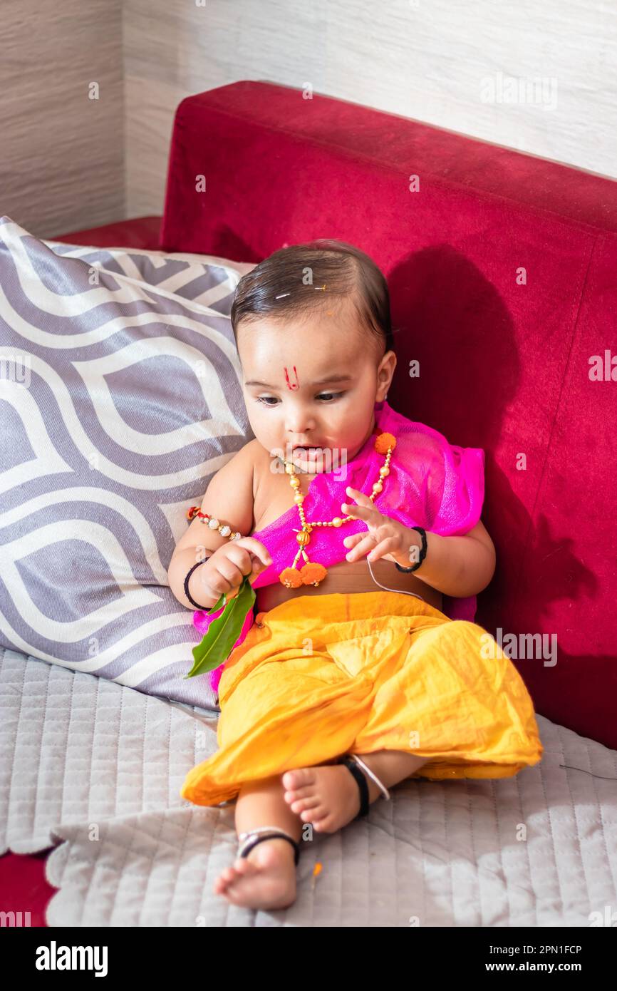 cute Indian boy dresses as lord rama with bow and flowers from top ...