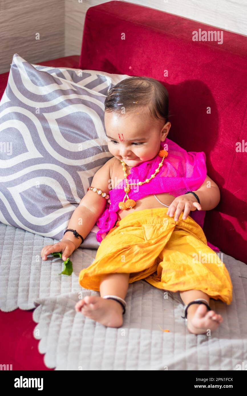 cute Indian boy dresses as lord rama with bow and flowers from top ...