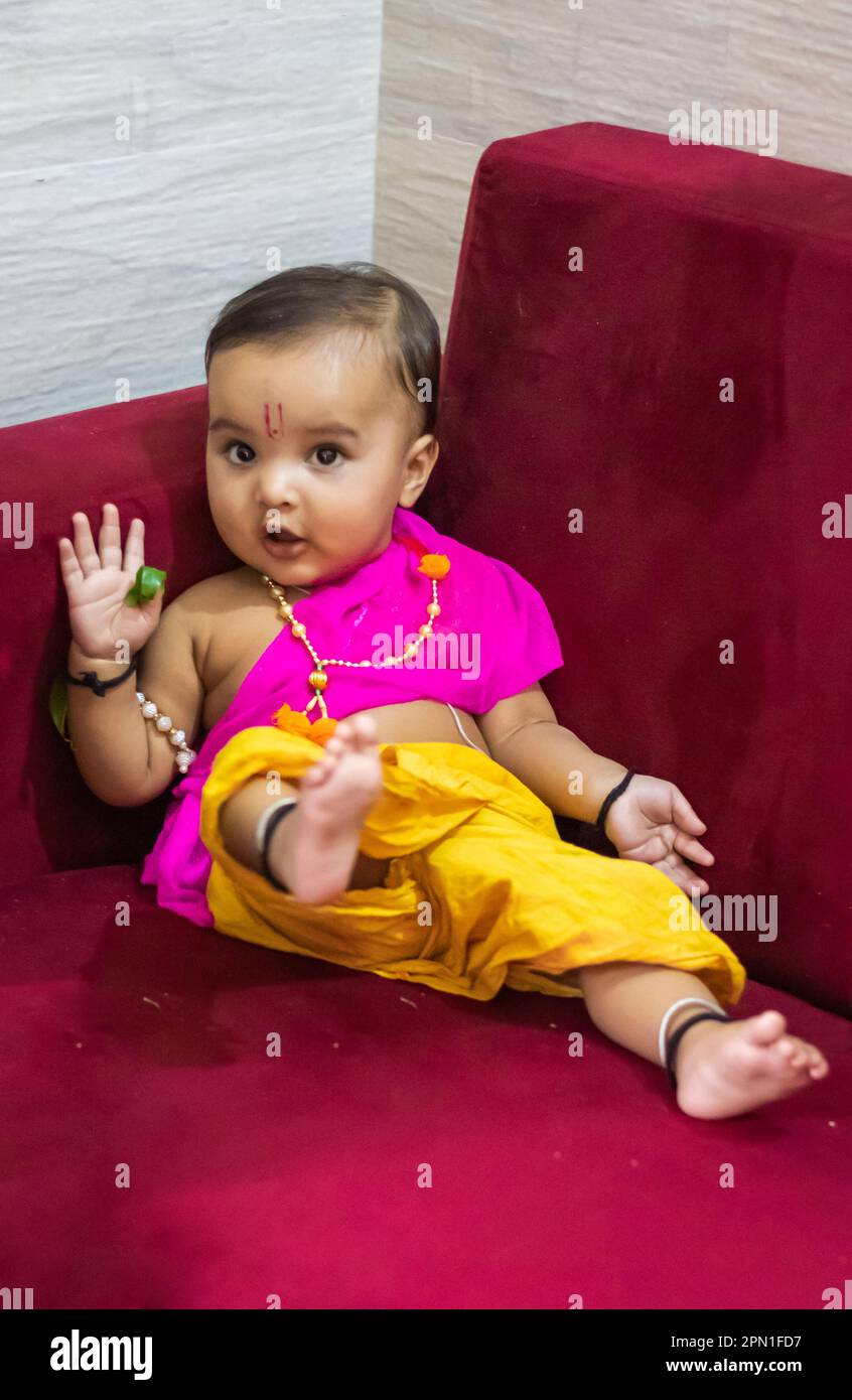 cute Indian boy dresses as lord rama with bow and flowers from top ...