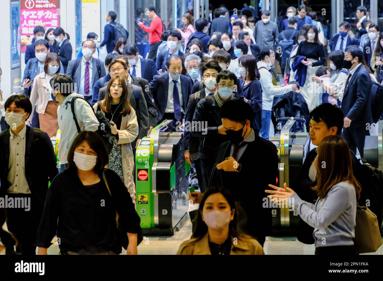 Tokyo, Japan. 14th Apr, 2023. People cross the concourse of JR Tokyo Station to get to their ...