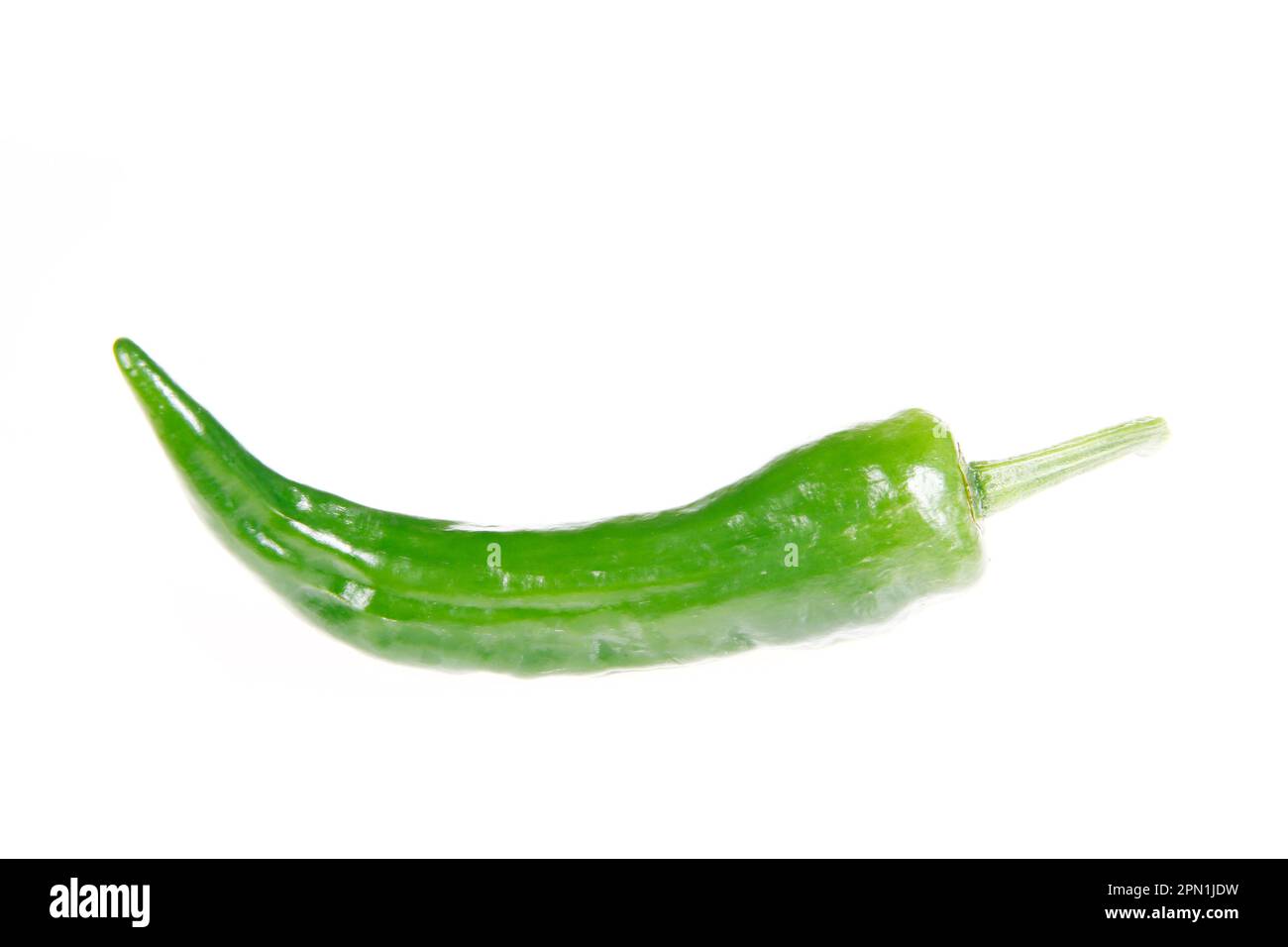 Fresh green chilies on white background Stock Photo - Alamy