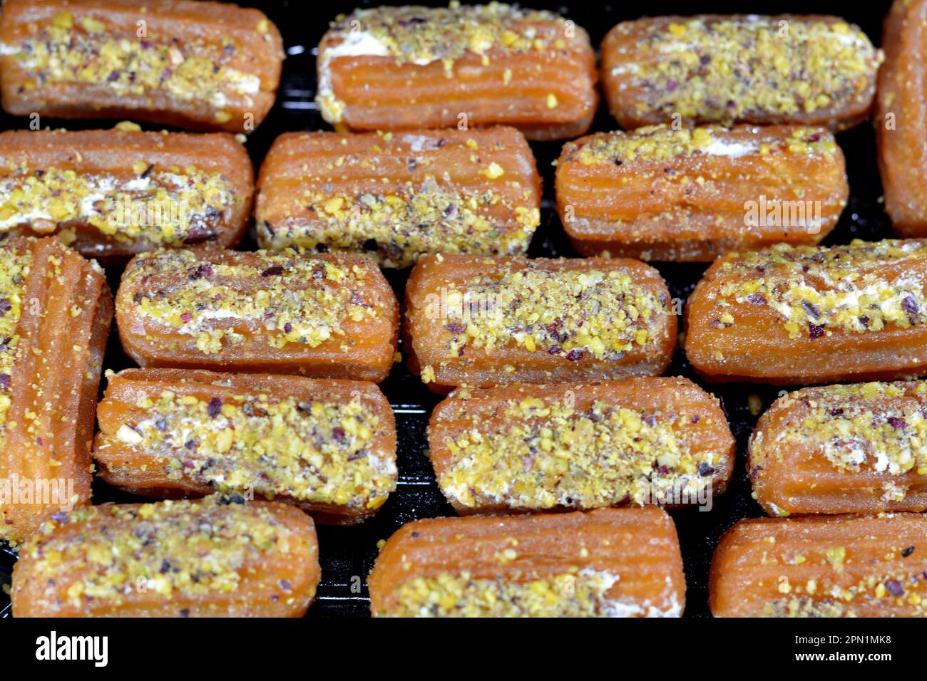 Syrup soaked fritters hi-res stock photography and images - Alamy