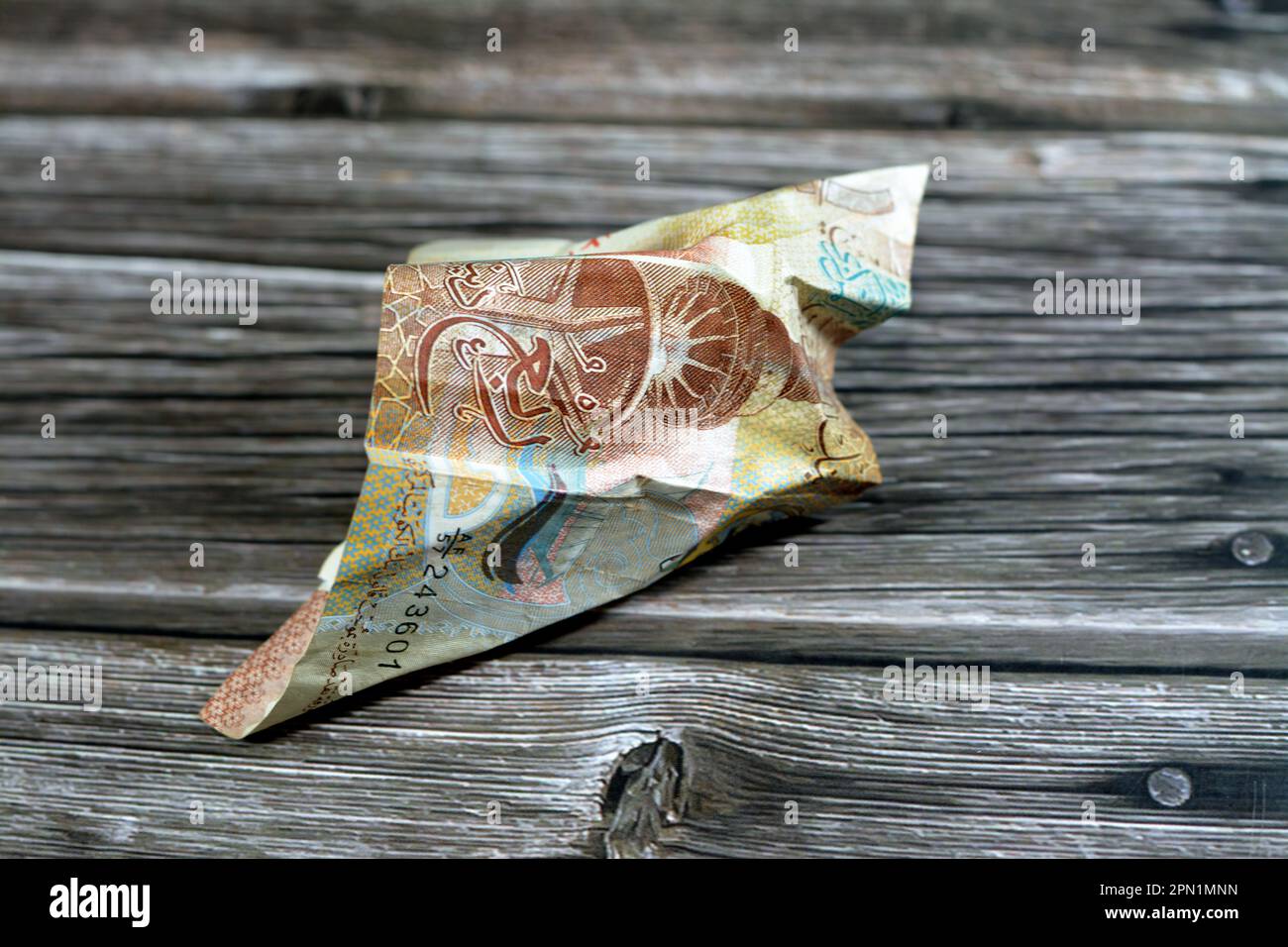 Crumpled Kuwaiti money of change KWD quarter Kuwait dinar bill banknote ...