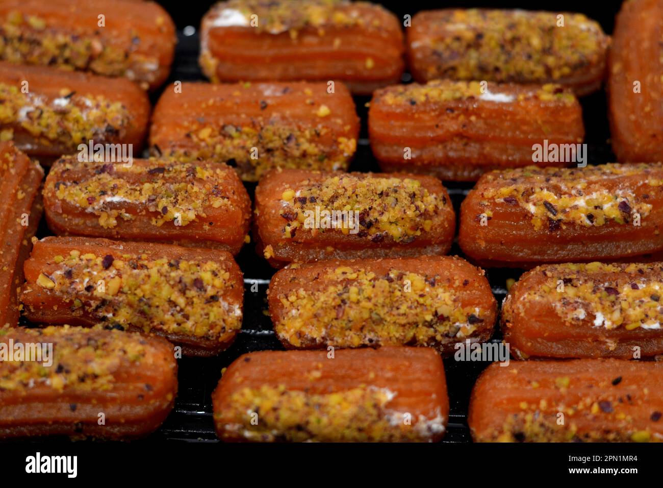 Syrup soaked fritters hi-res stock photography and images - Alamy