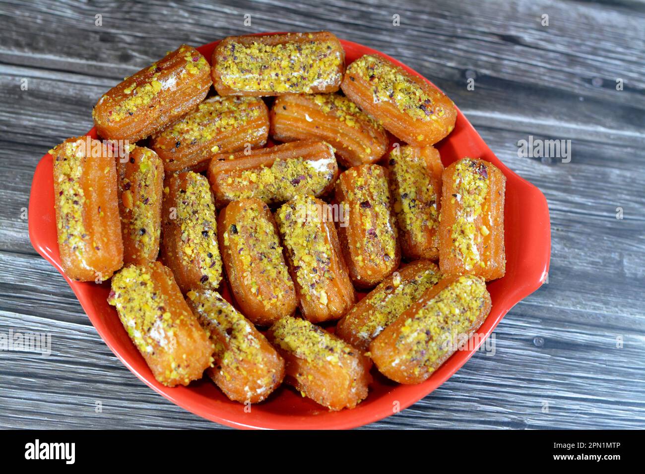 Syrup soaked fritters hi-res stock photography and images - Alamy