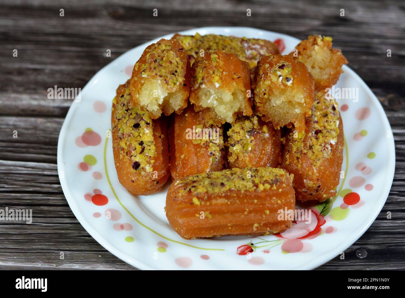 Syrup soaked fritters hi-res stock photography and images - Alamy