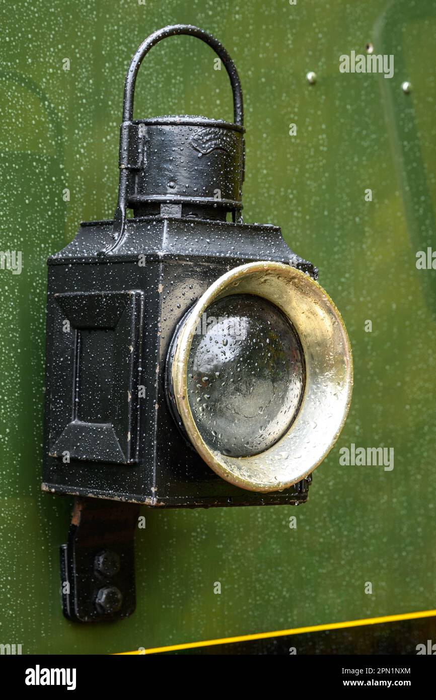 Old black railroad lamp on a steam engine Stock Photo - Alamy