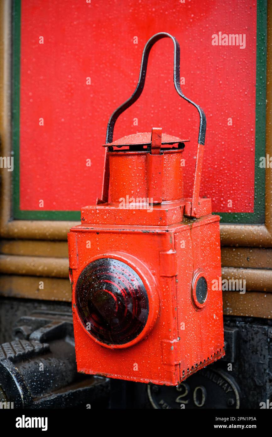 Old red railroad lamp on a steam engine Stock Photo - Alamy