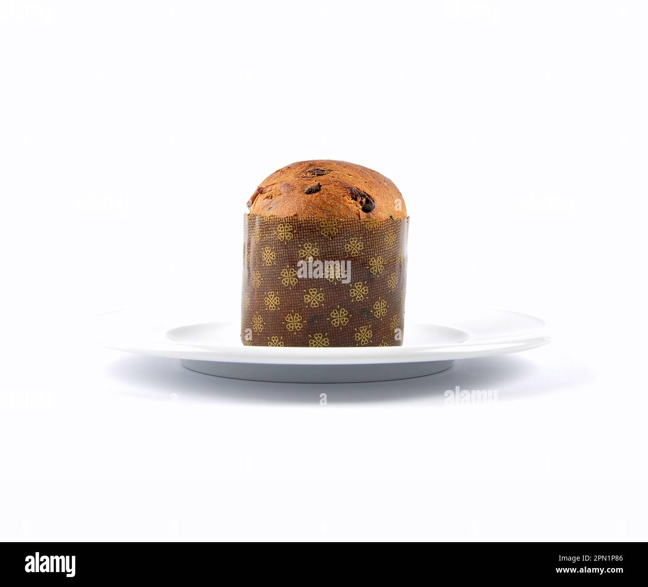 Paper shaped chocolate muffin on plate and white background Stock Photo ...
