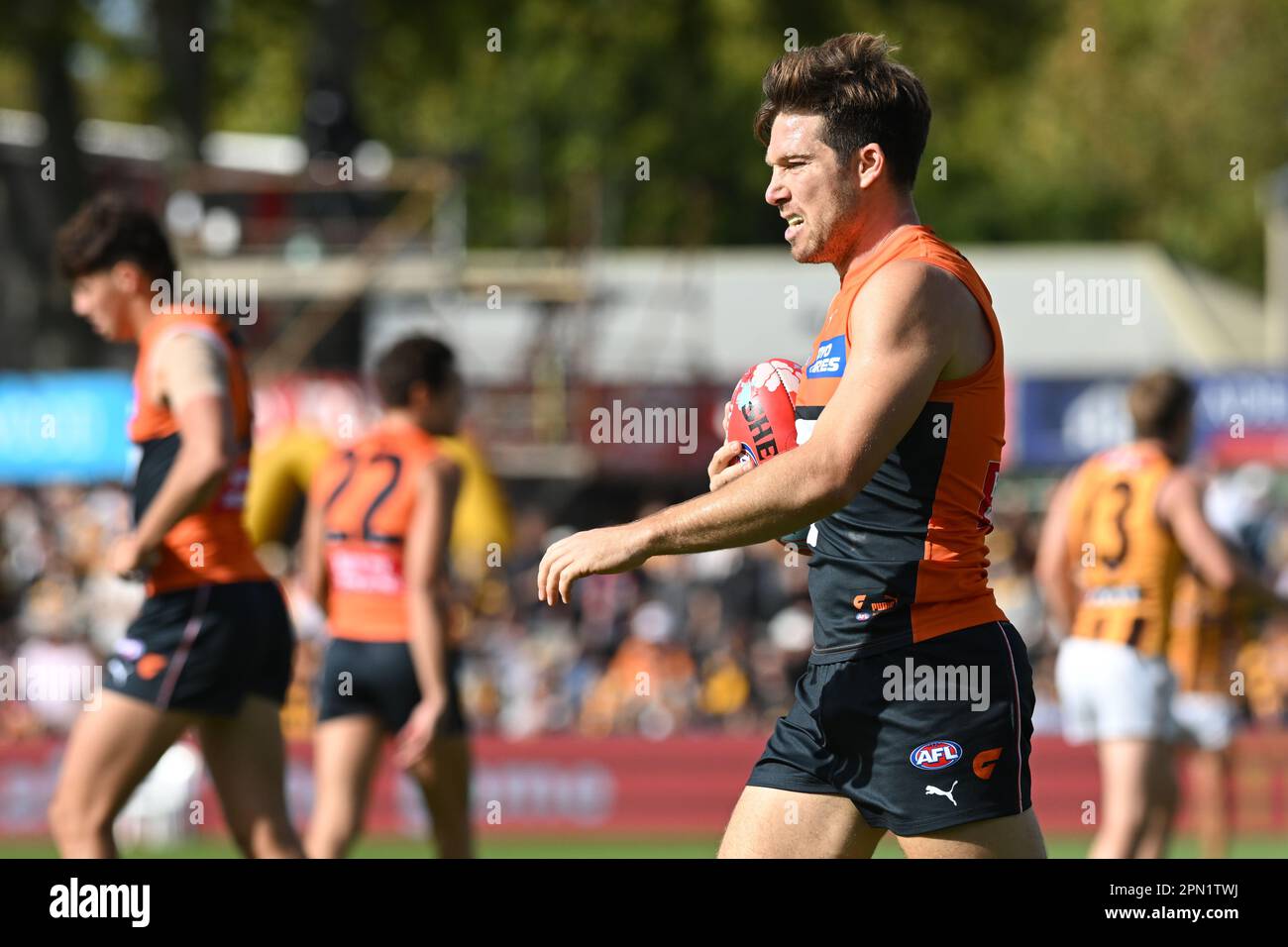 Toby Greene of Greater Western Sydney walks back to take a shot on goal ...