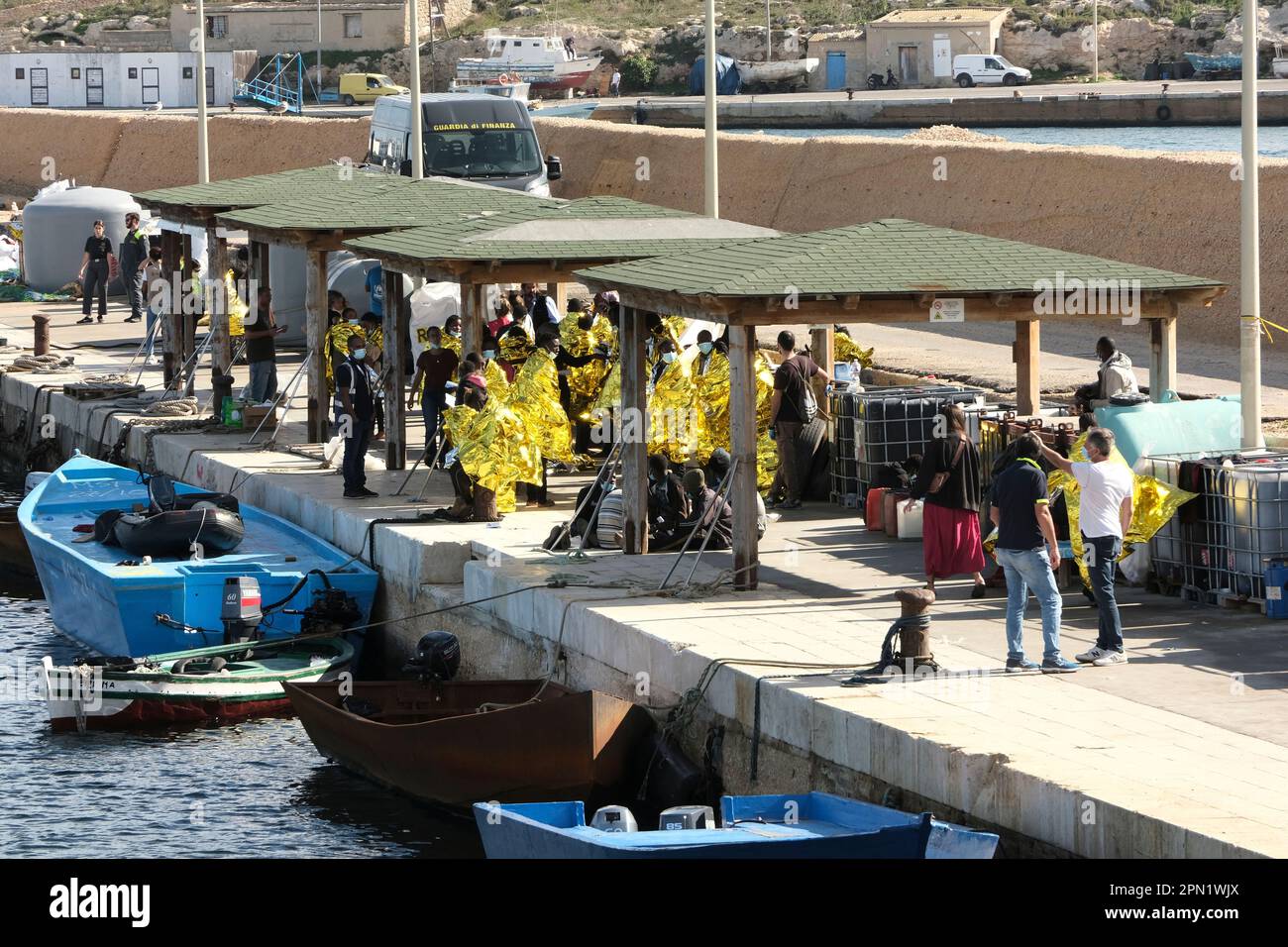 Lampedusa migrants coast boat hi-res stock photography and images - Alamy