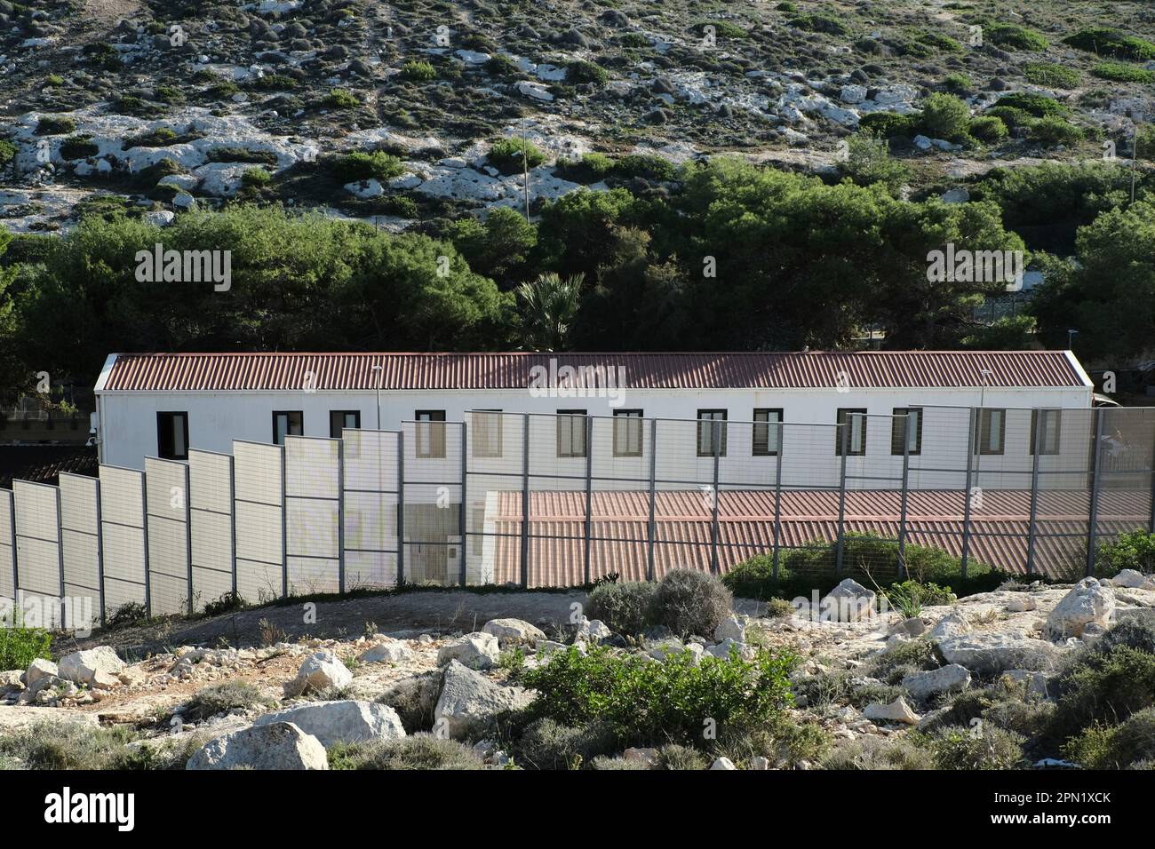 Lampedusa migrants center hi-res stock photography and images - Alamy