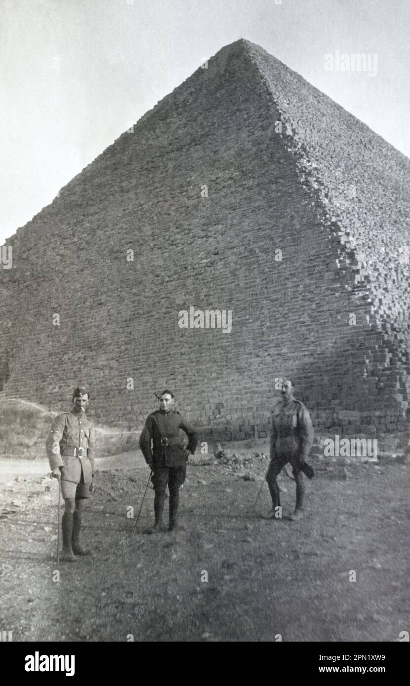 Royal Flying Corps airmen standing in front of a pyramid whilst serving in the Middle East ...