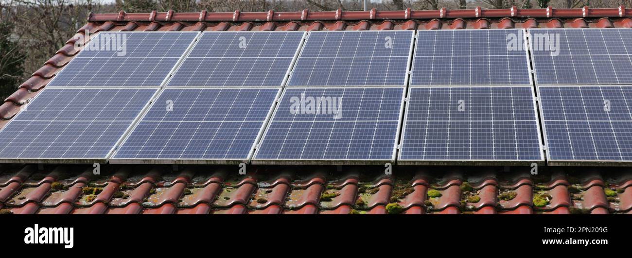 Photovoltaic Panel Solar panel installed on a roof Stock Photo - Alamy