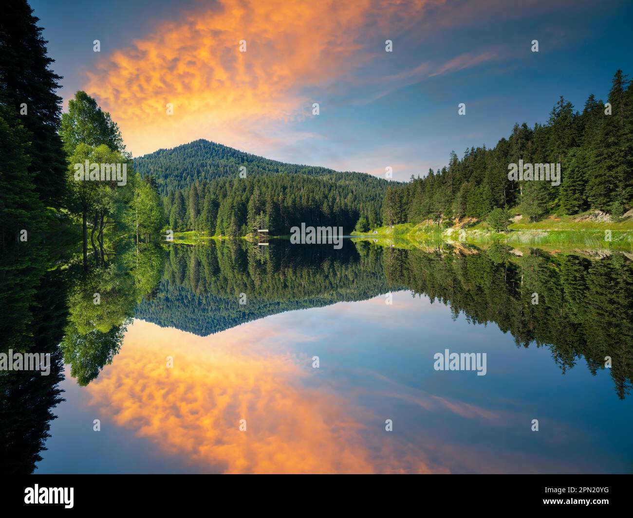 Reflection of mountain lake at perfect sunrise. Nature background Stock ...