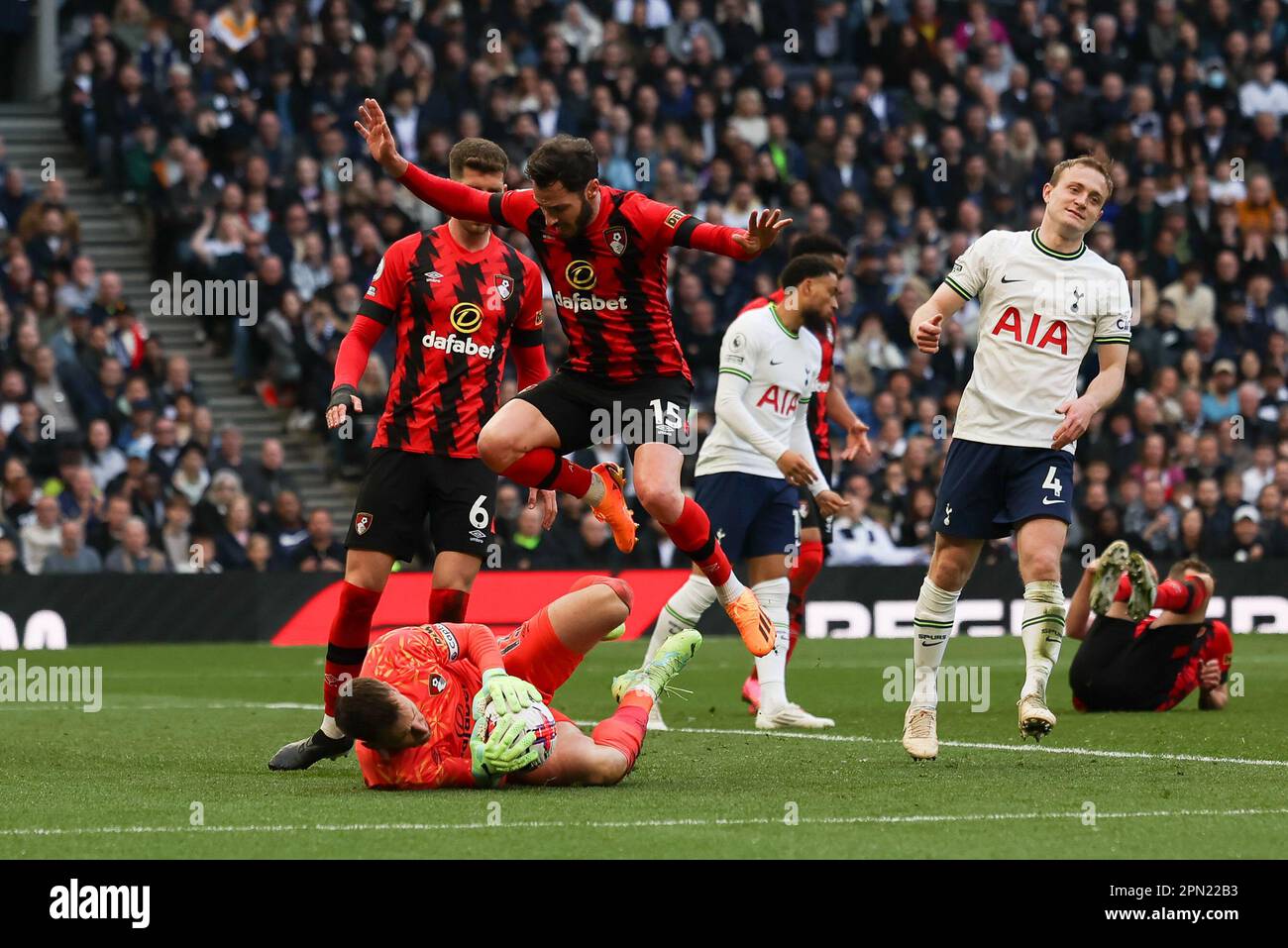 London, UK. 16th Apr, 2023. Adam Smith of Bournemouth avoids colliding ...