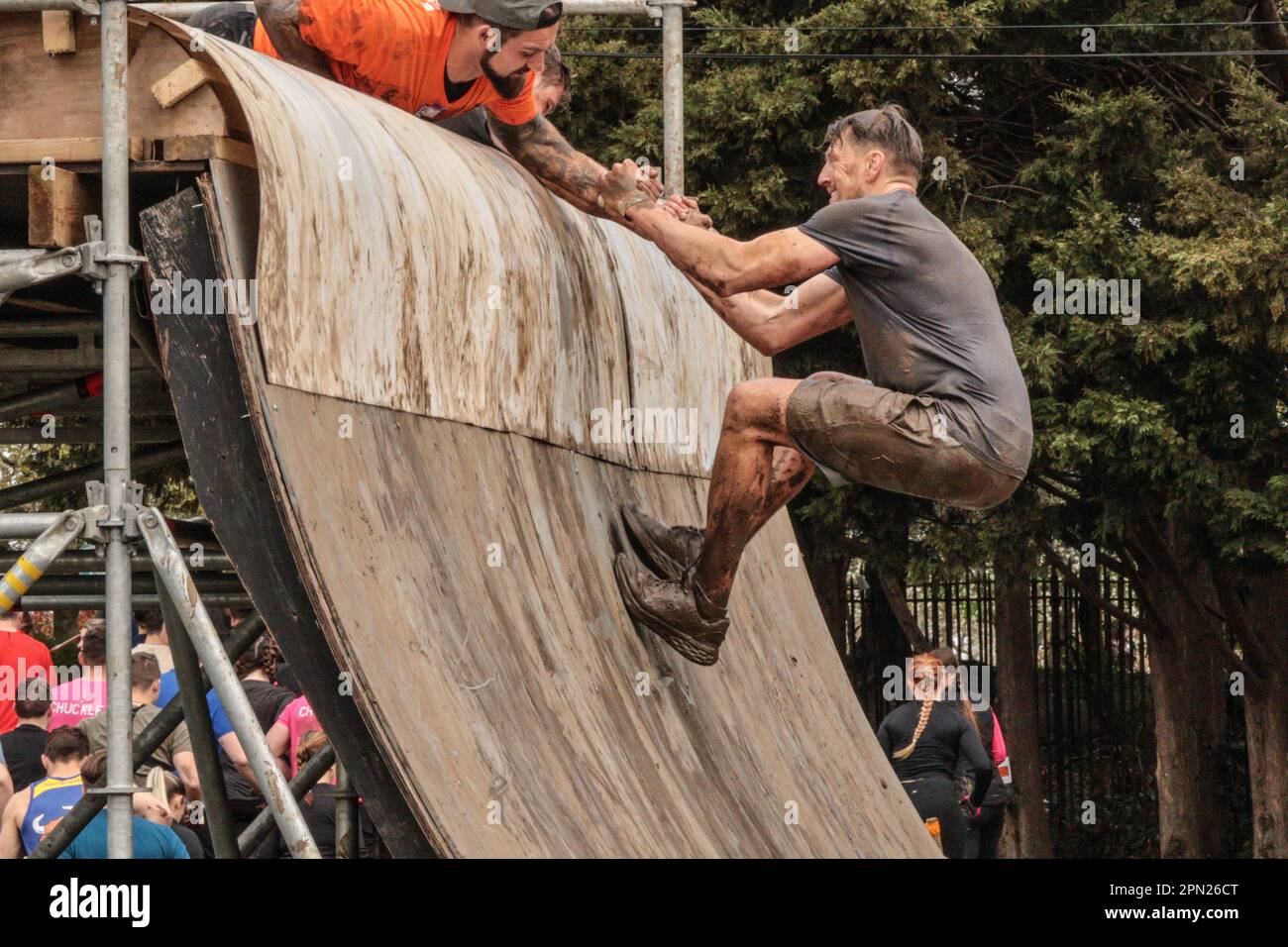People running trough electric wires hi-res stock photography and ...