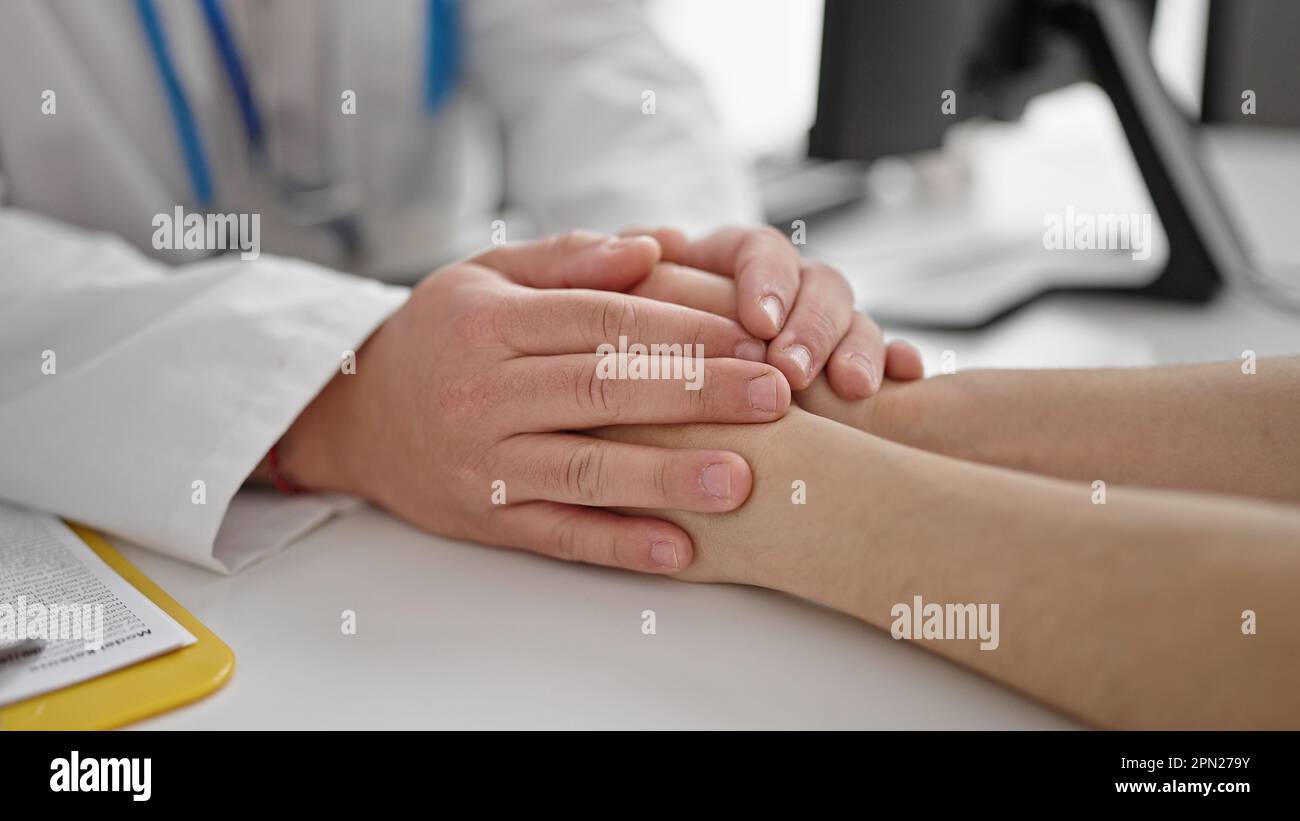 Doctor hands together desk hi-res stock photography and images - Alamy