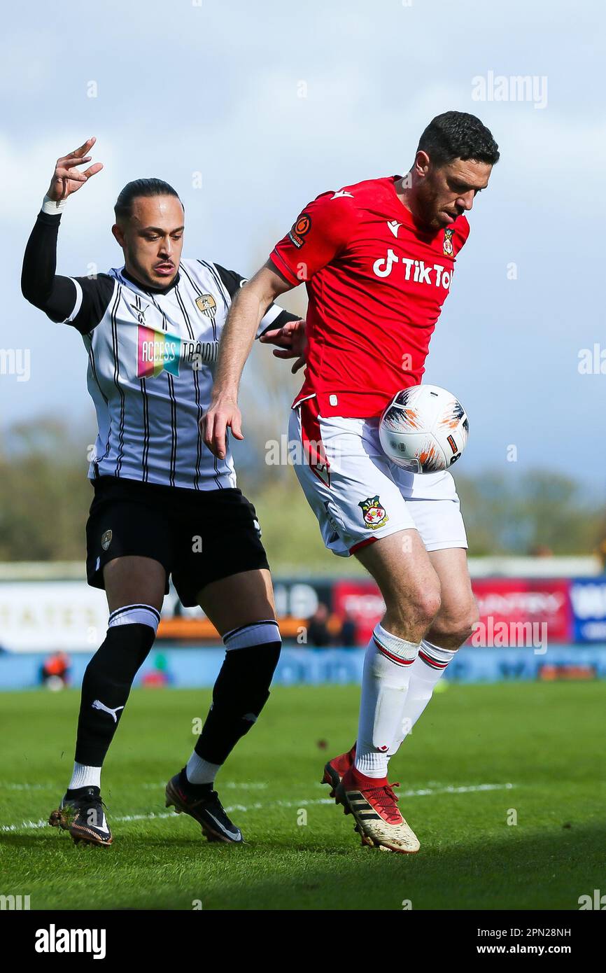 Wrexham's Ben Tozer (right) and Notts County's Jodi Jones battle for ...