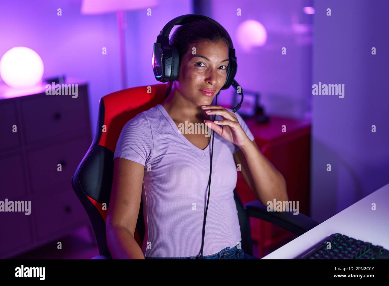Young beautiful hispanic woman streamer smiling confident sitting on ...