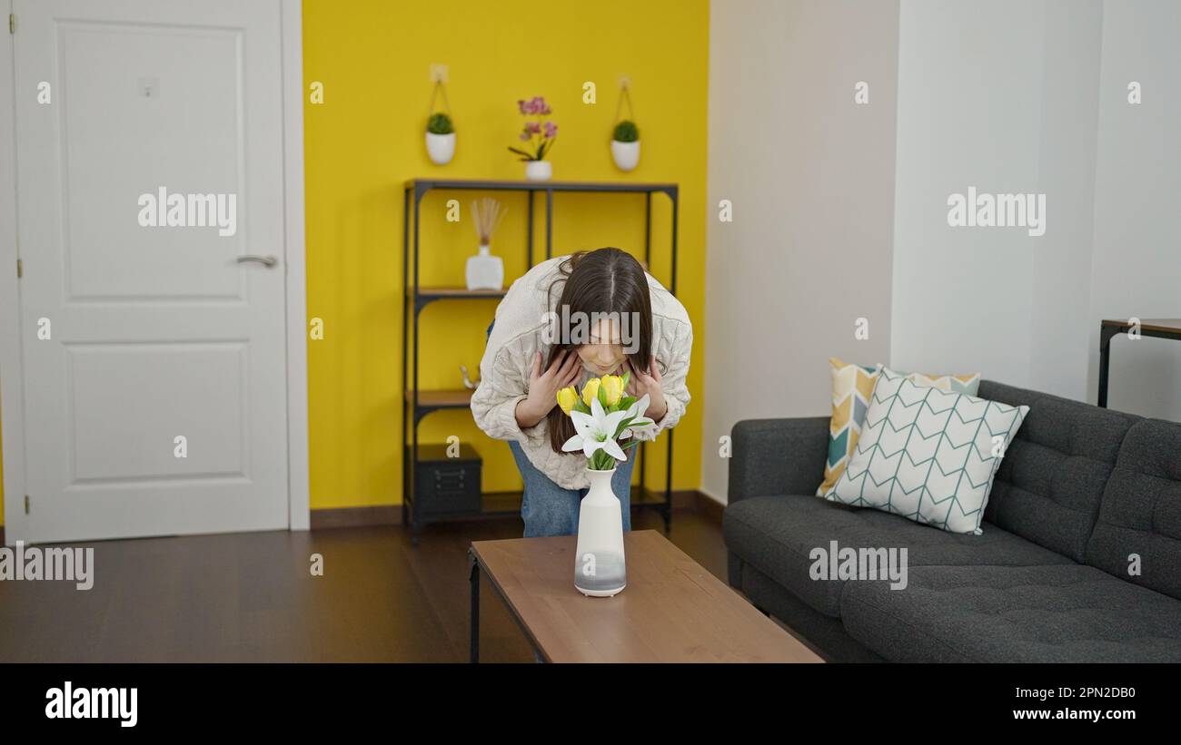 Young attractive woman smelling spring hi-res stock photography and ...