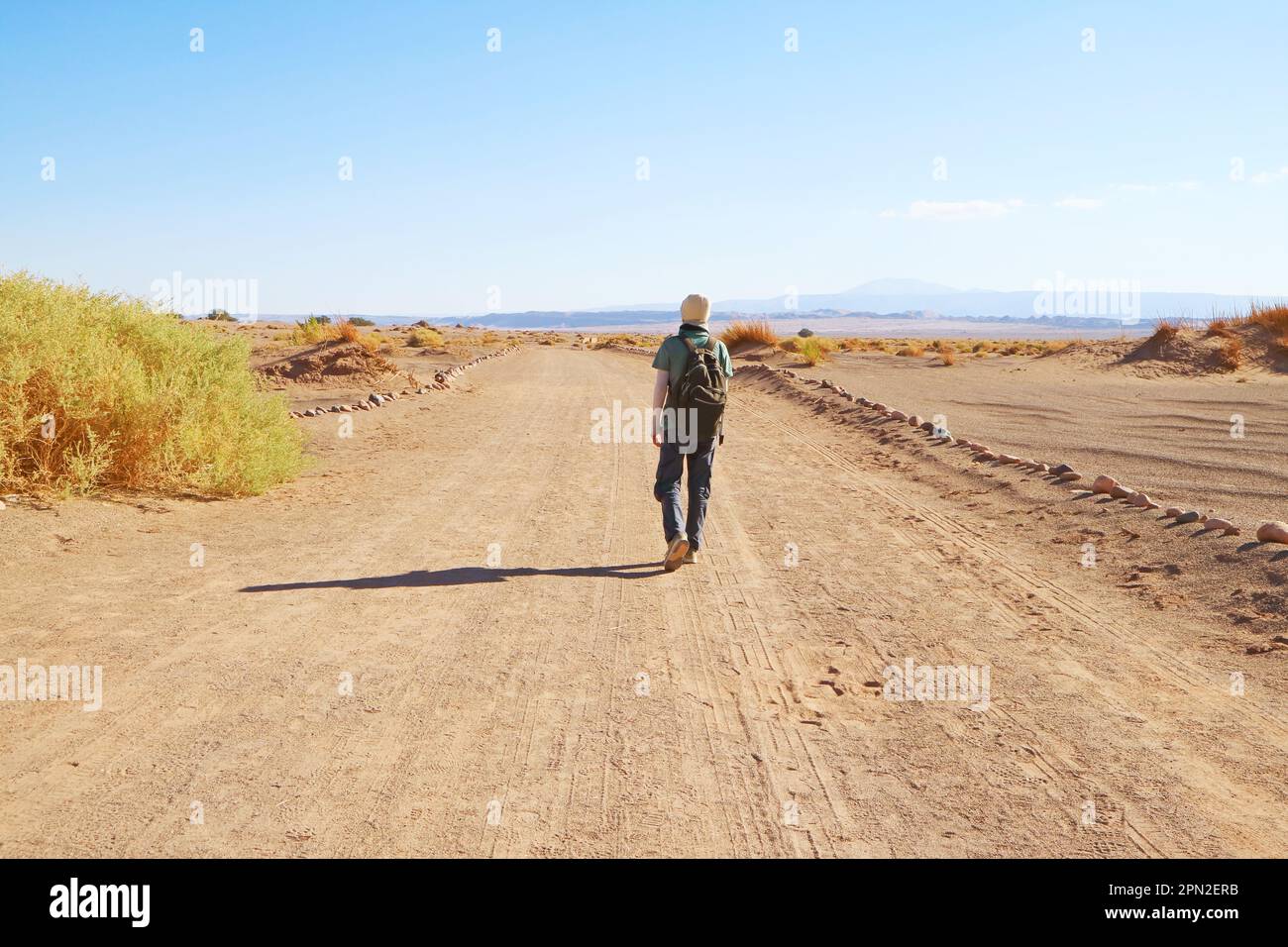 Traveler Walking on the Desert Road of Aldea de Tulor Archaeological ...