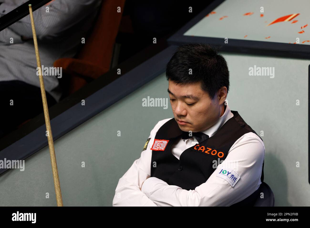 Ding Junhui looks dejected during day two of the Cazoo World Snooker ...