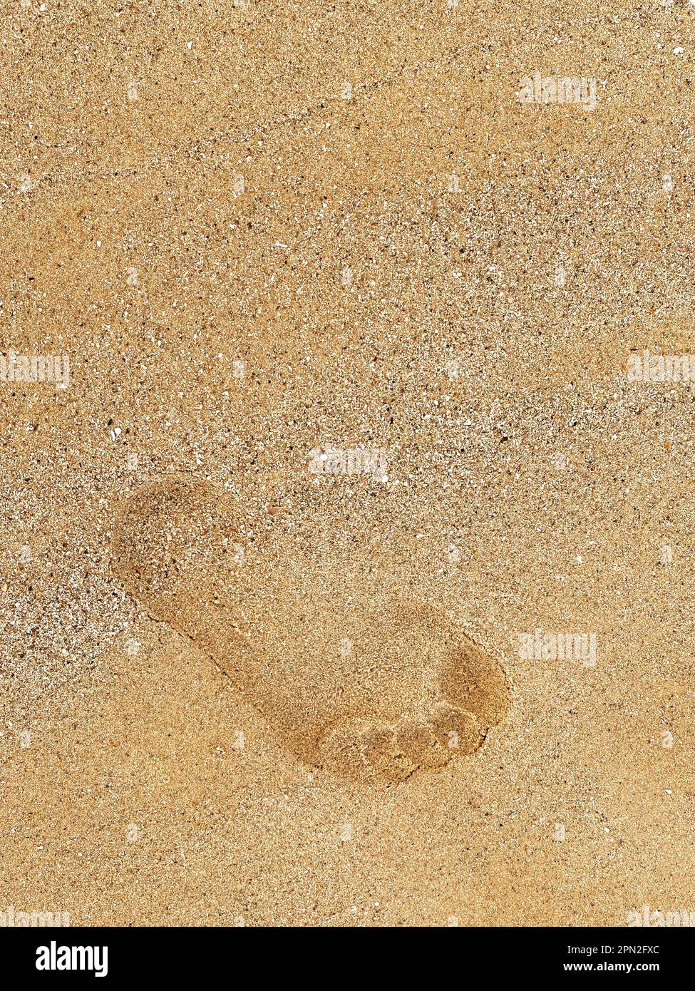 Leaving footprint on the sand. Close-up footprint from foot step ...