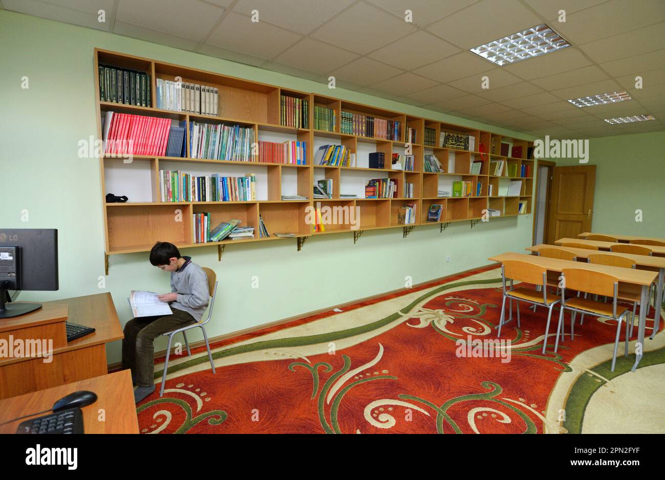 Library of the medrese. Muslim boy reading a book. October 21, 2018 ...