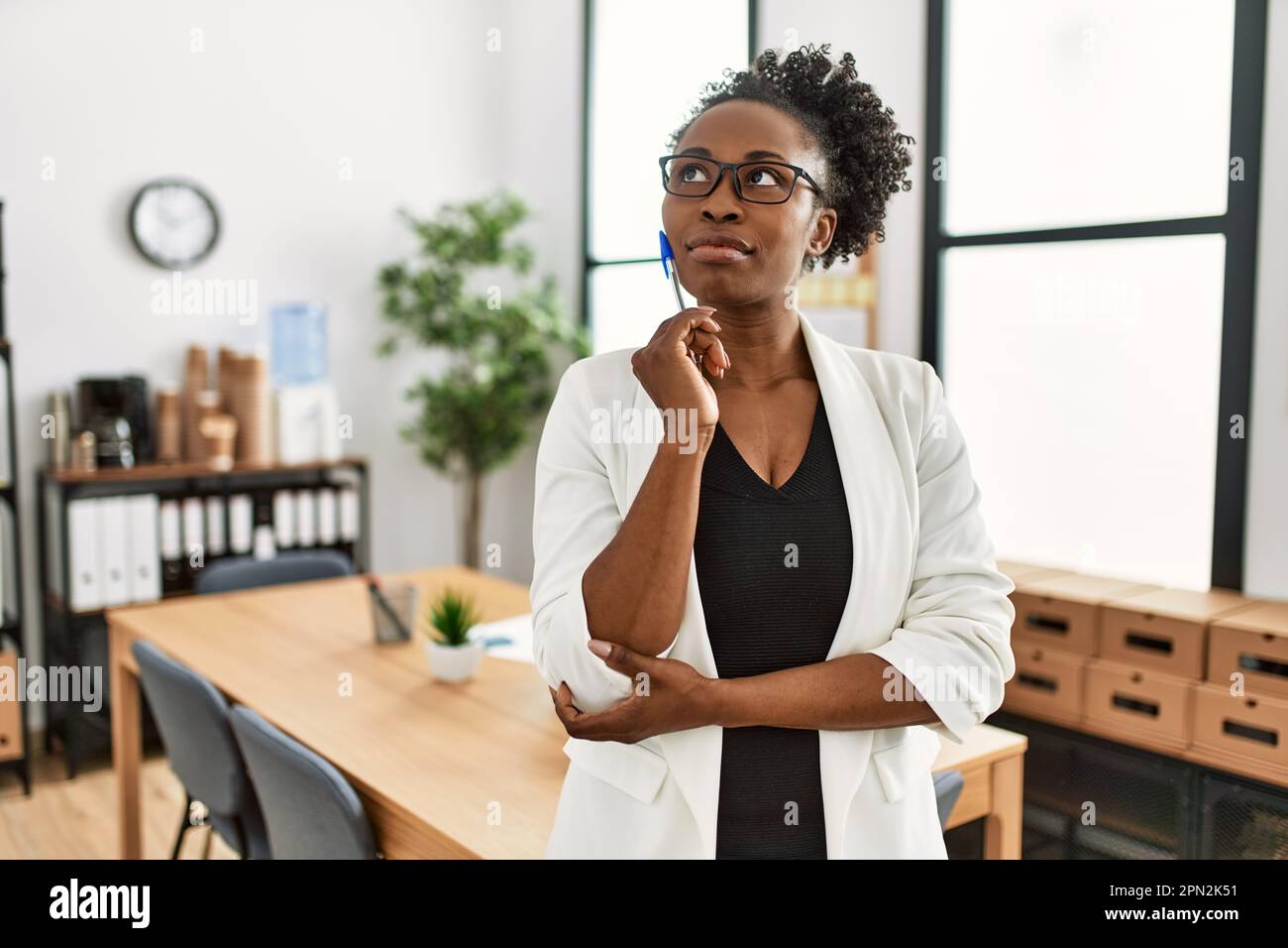 African american woman business worker standing with doubt expression ...