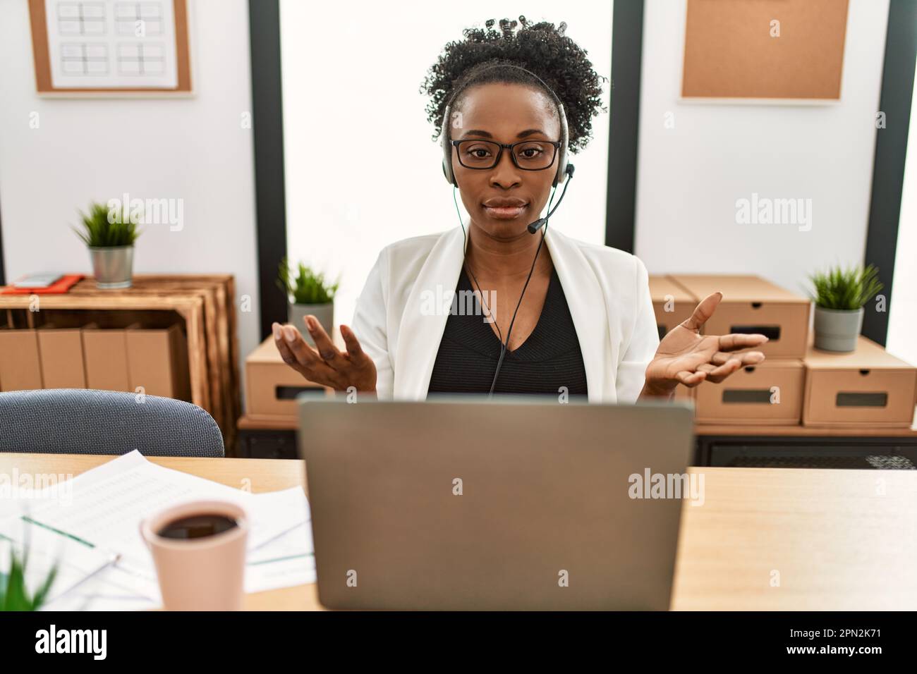 African american woman call center agent speaking at office Stock Photo ...