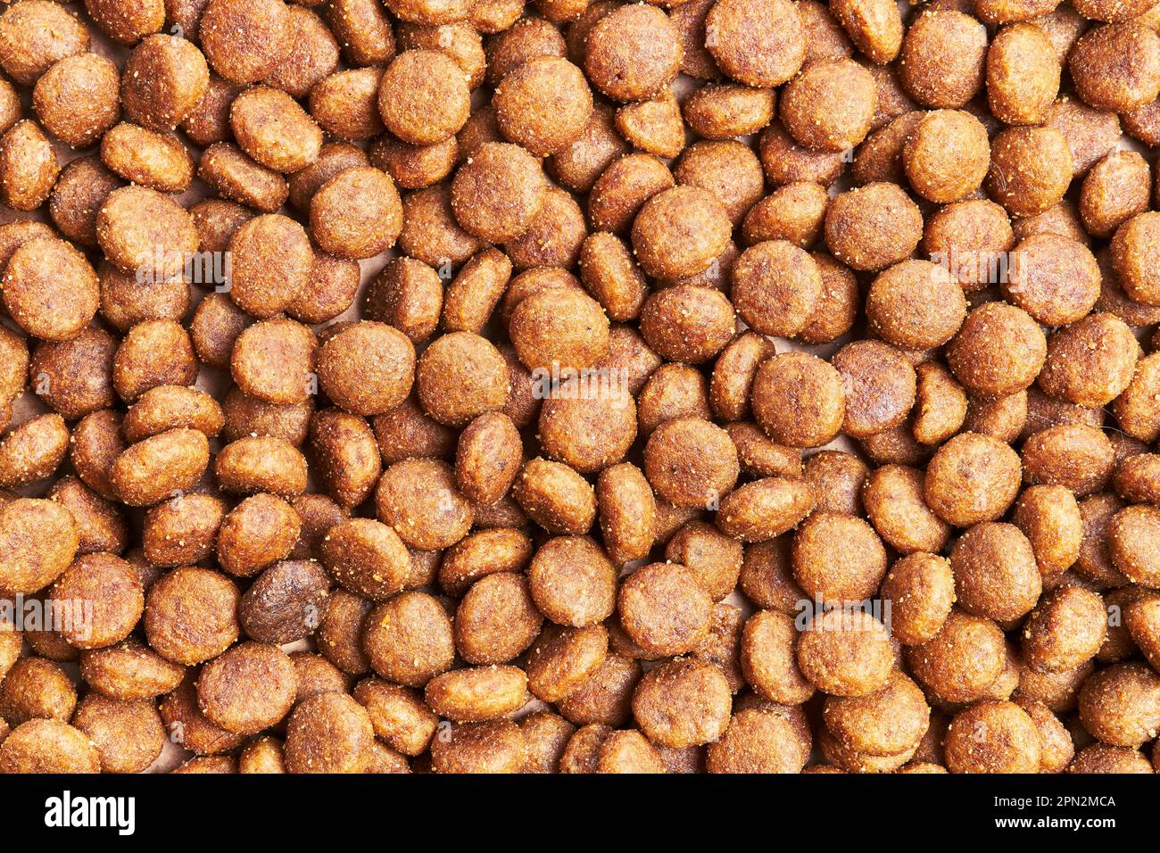 Delicious group of dog food balls texture Stock Photo - Alamy